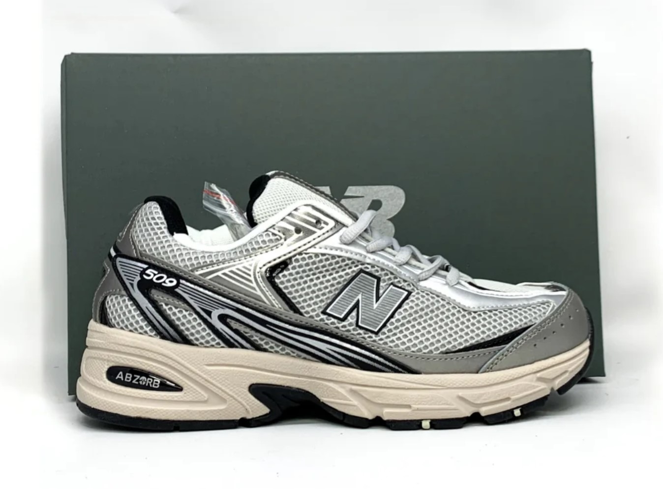 New Balance/NB 509 Silver Metallic - Web Sepatu