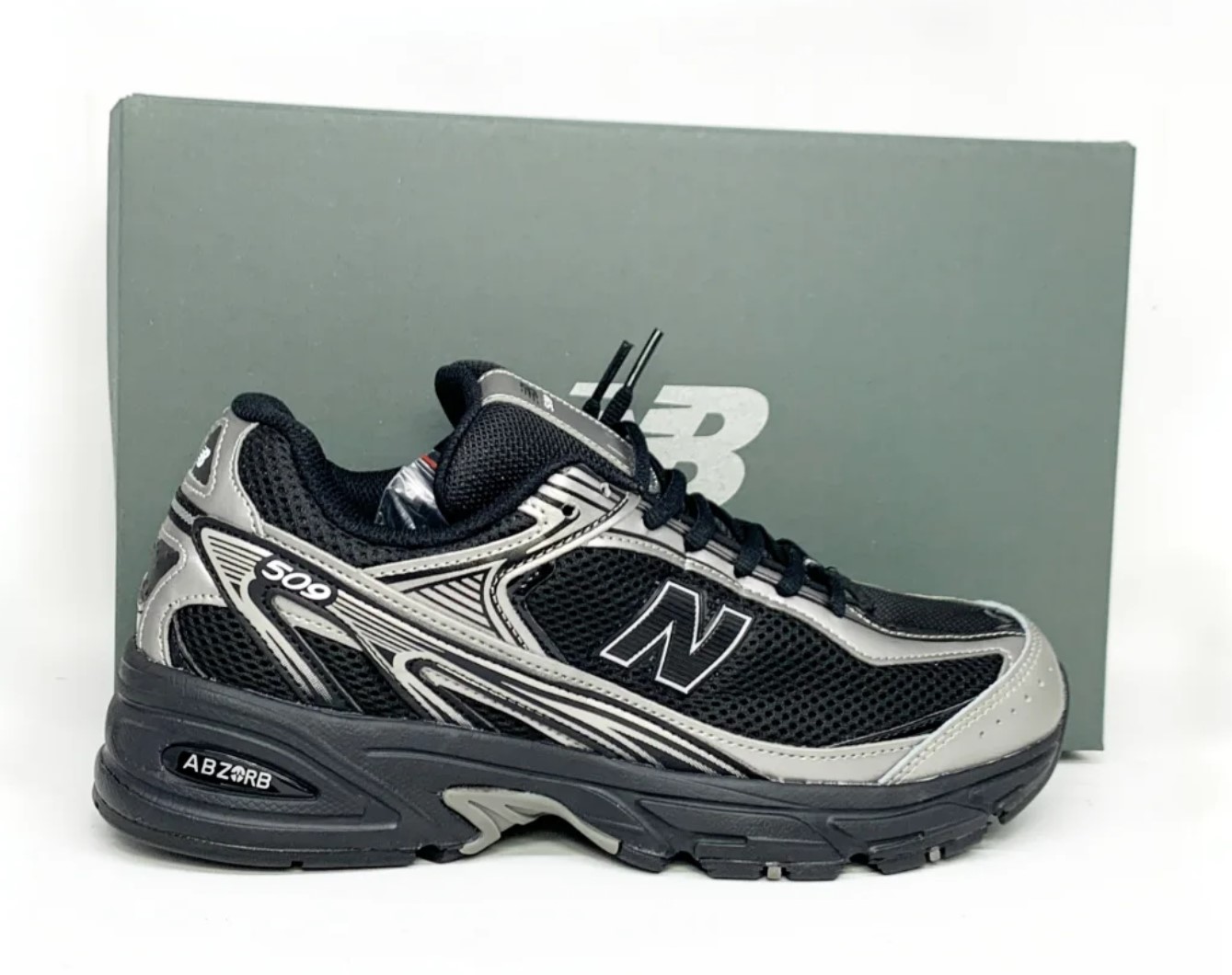 New Balance/NB 509 Black Silver - Web Sepatu